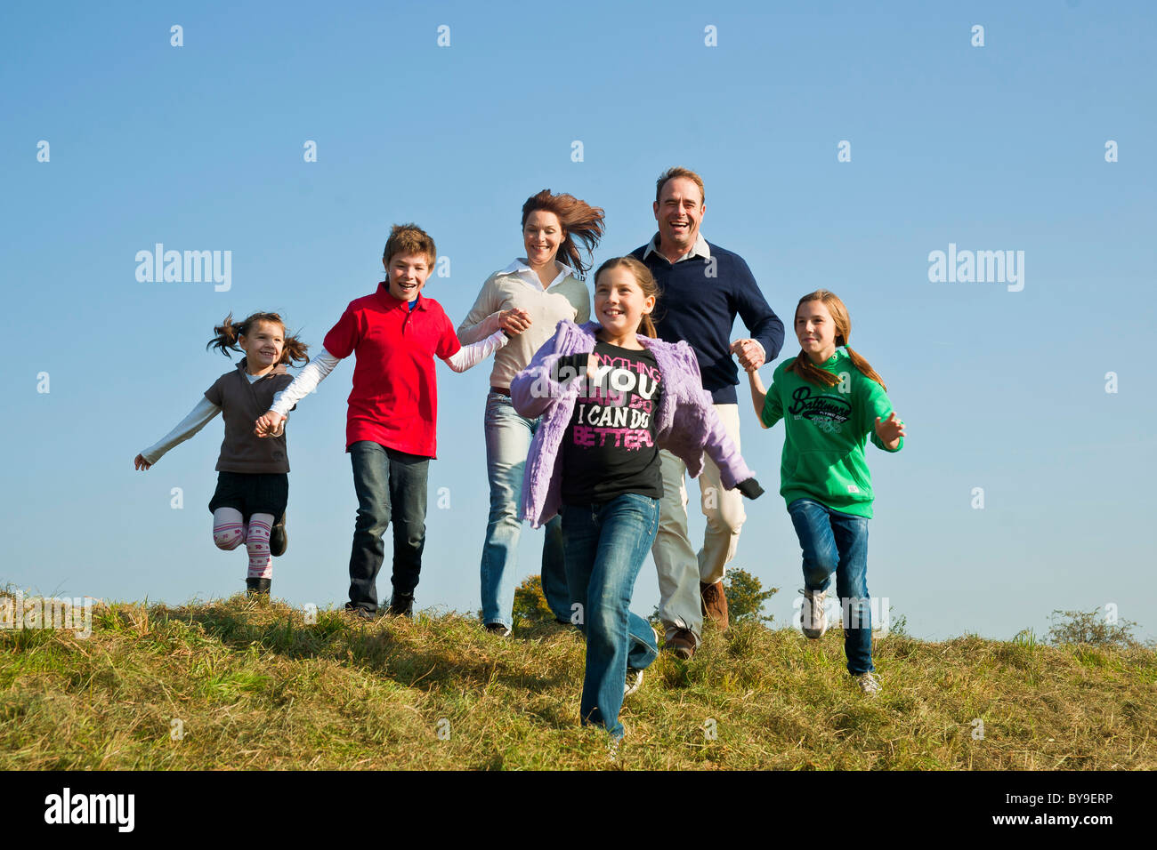 Happy family outdoors Stock Photo - Alamy