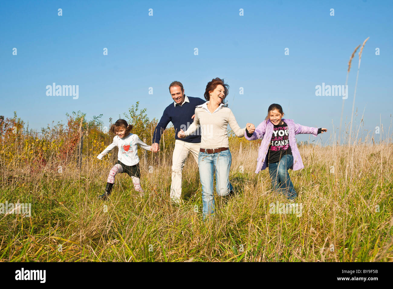 Happy families outdoors hi-res stock photography and images - Alamy