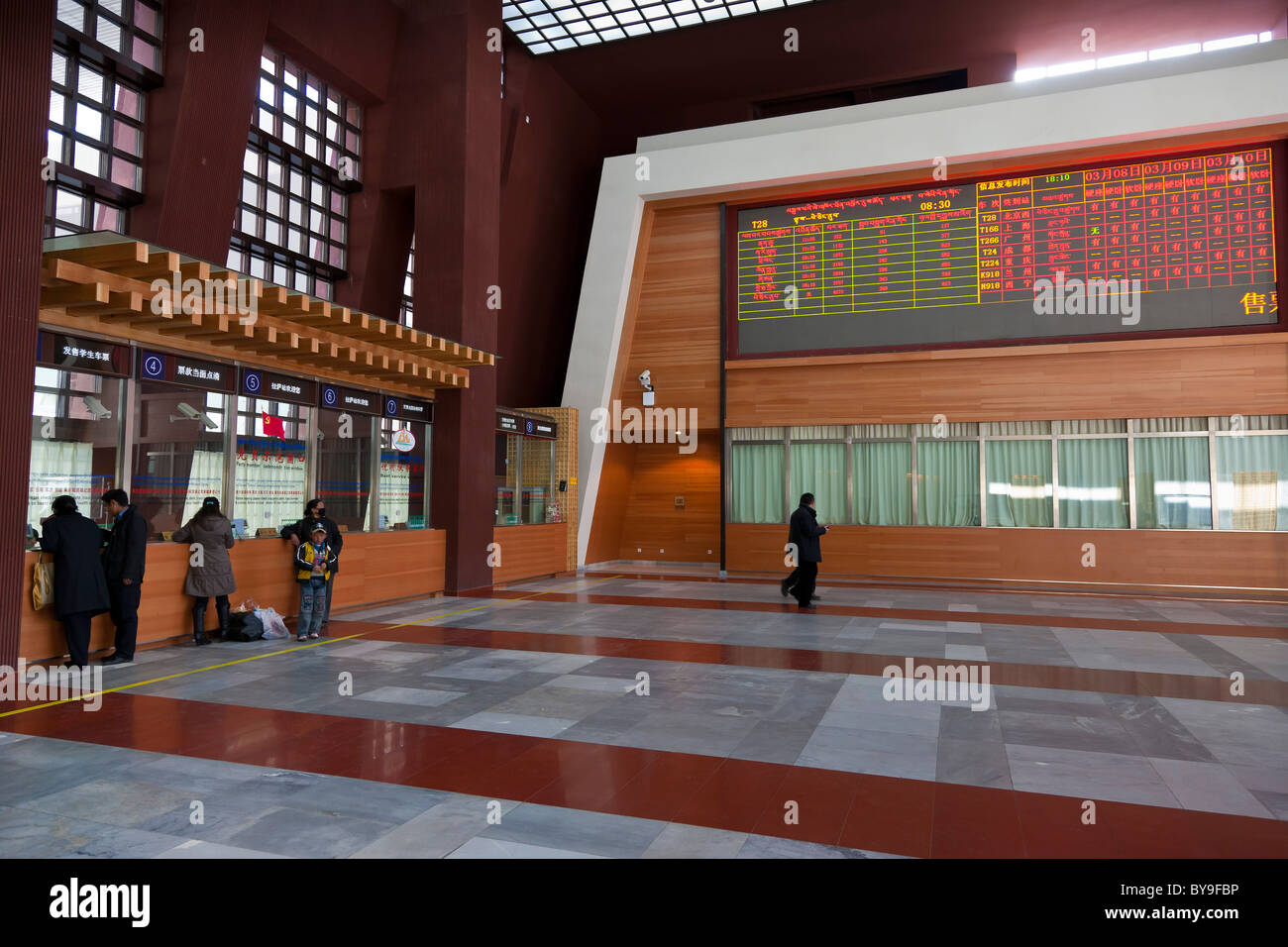 Booking hall and electronic departure board of the railway station ...