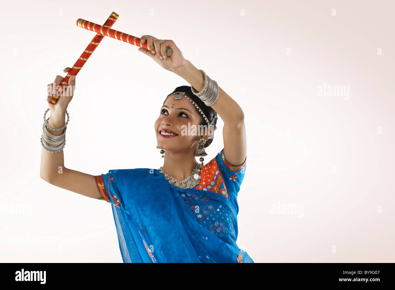 Women performing traditional dandiya dance hi-res stock photography and ...