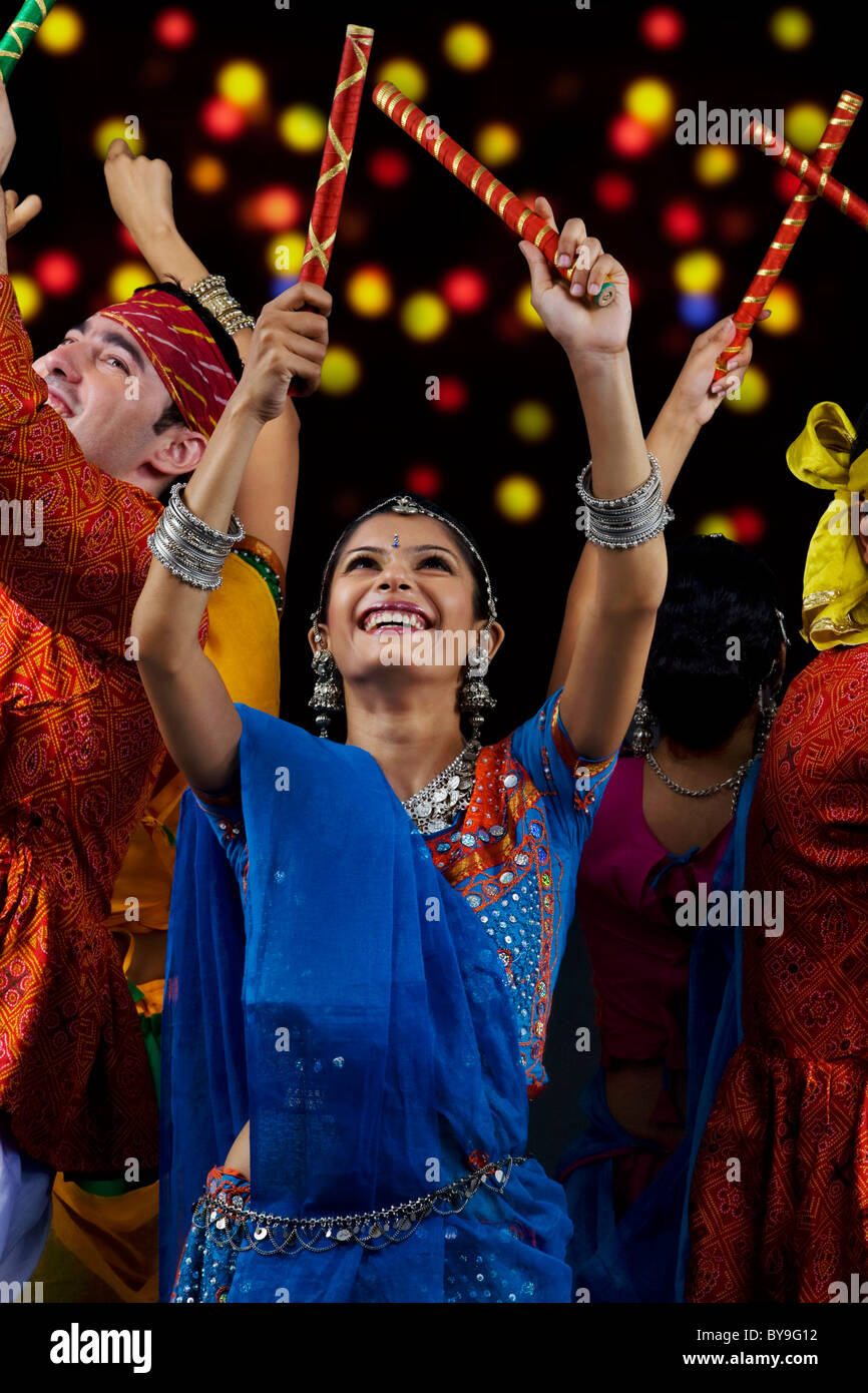 Holding dandiya hi-res stock photography and images - Alamy