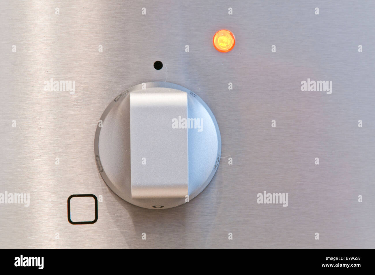 Cooker control knob Stock Photo - Alamy