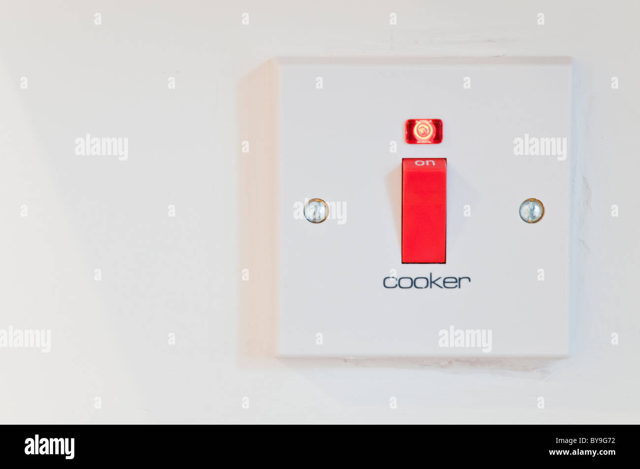Cooker power switch Stock Photo - Alamy