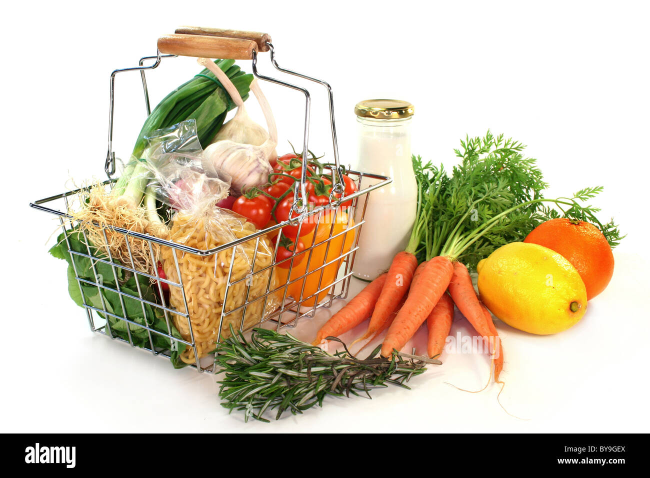 Shopping basket filled with various vegetables Stock Photo - Alamy