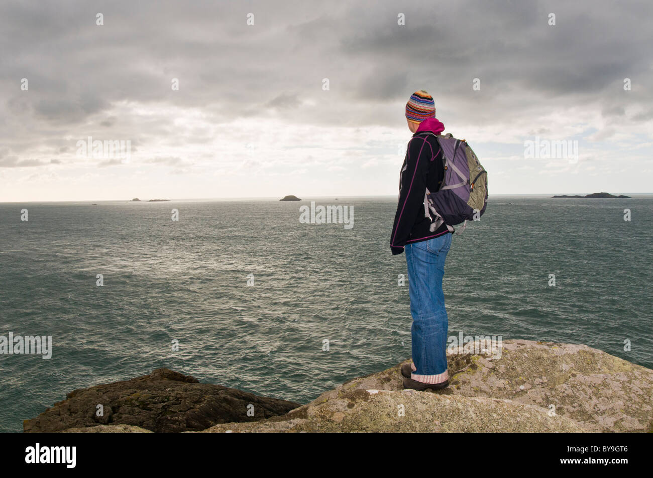 Woman cliff ocean storm hi-res stock photography and images - Alamy