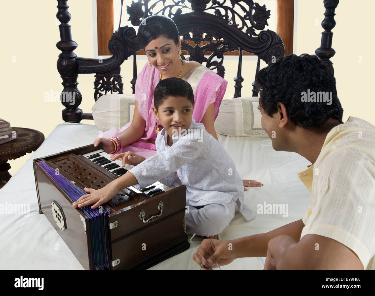 Child Playing Harmonium