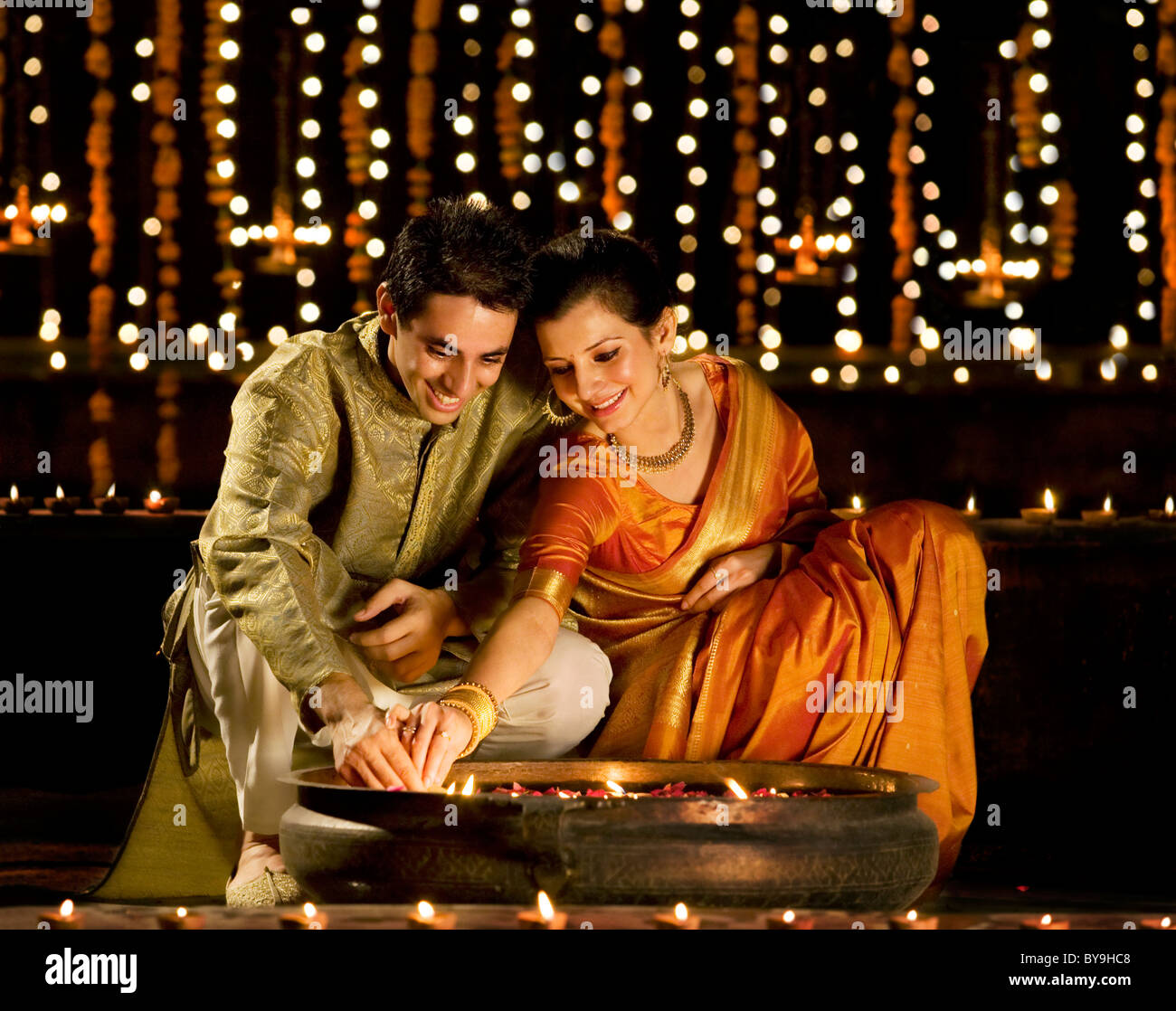Indian festival diwali diya arranging hi-res stock photography and ...