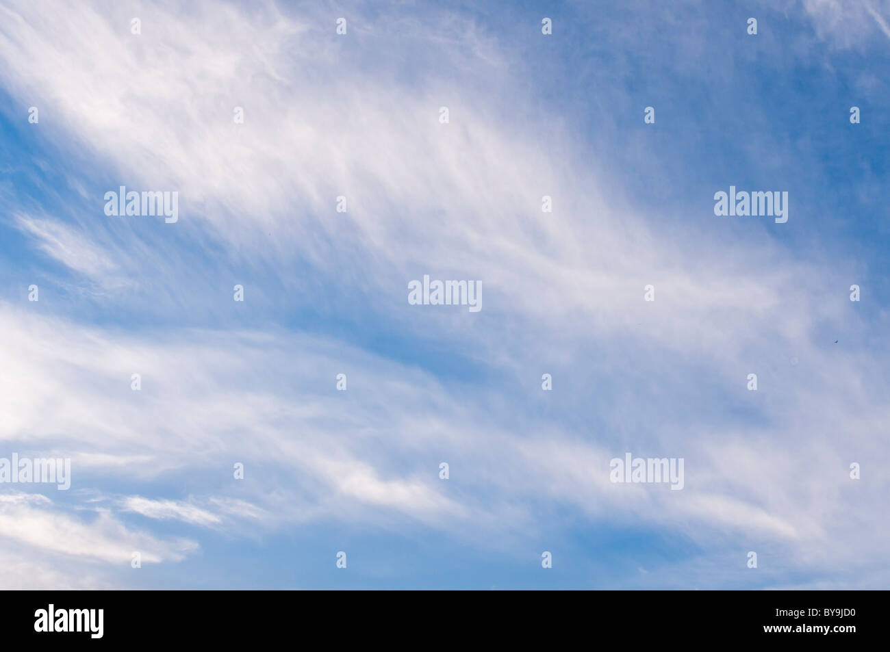 Blue daytime sky with clouds Stock Photo - Alamy
