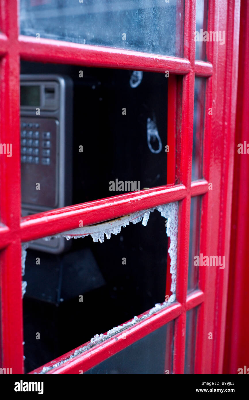 Vandalized phone box Stock Photo - Alamy