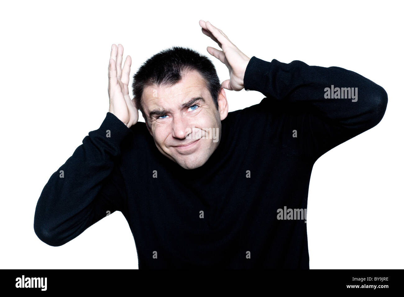 caucasian man portrait afraid shielding protecting his head portrait on ...