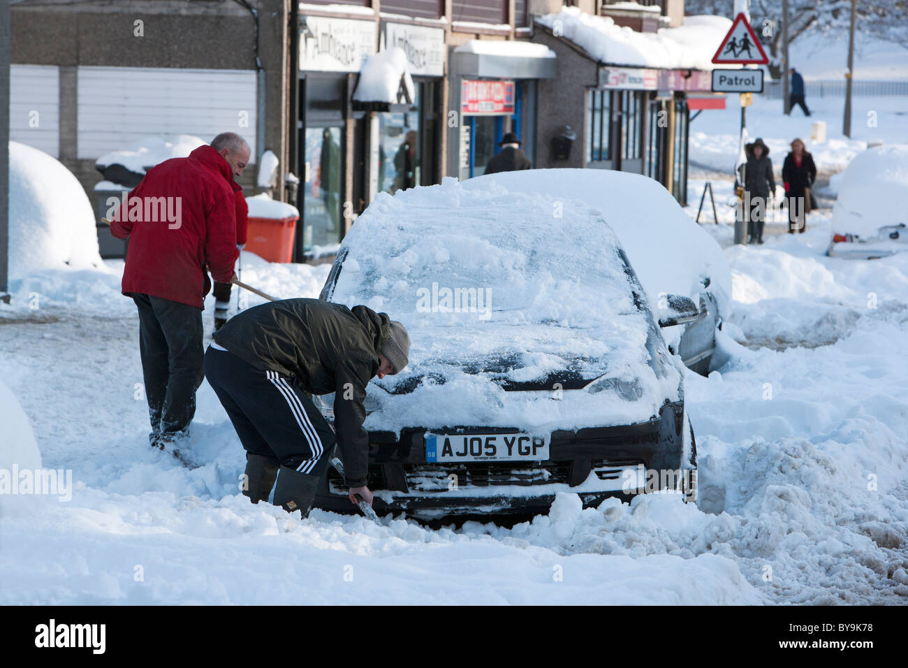 Digging out snow hi-res stock photography and images - Alamy