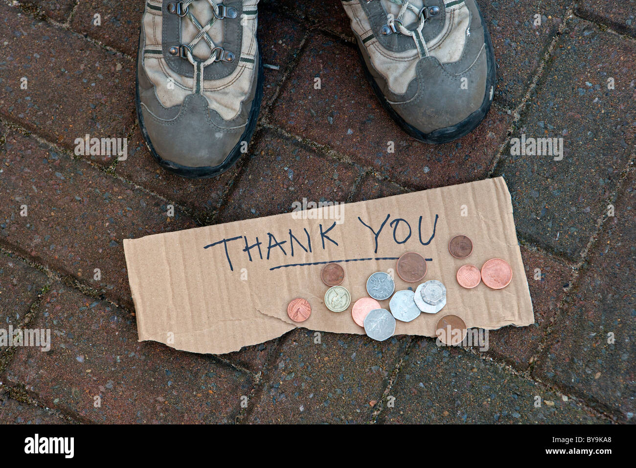 Giving Money To Beggar Stock Photos & Giving Money To Beggar Stock ...