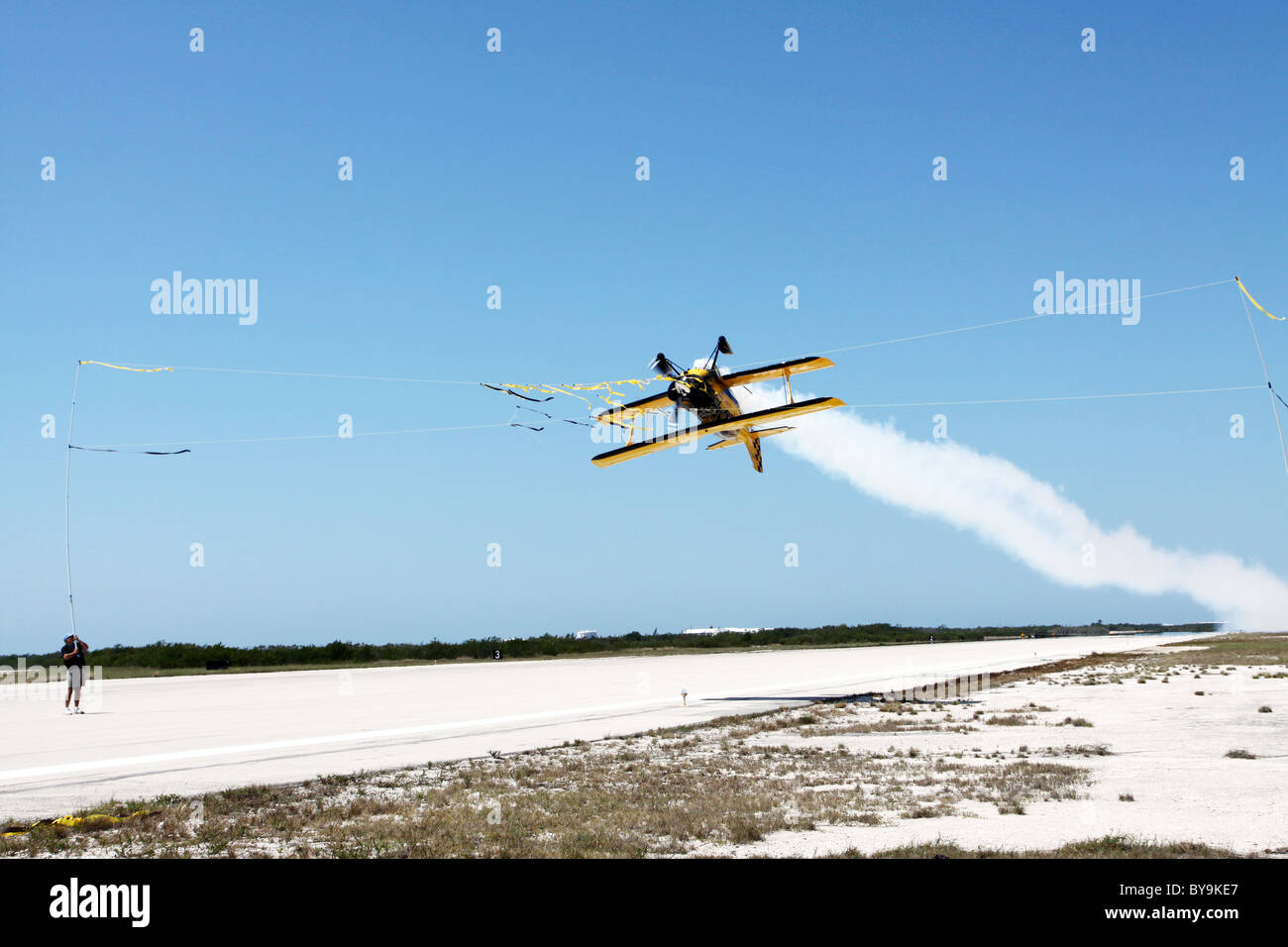 Inverted ribbon-cutting approach Stock Photo - Alamy