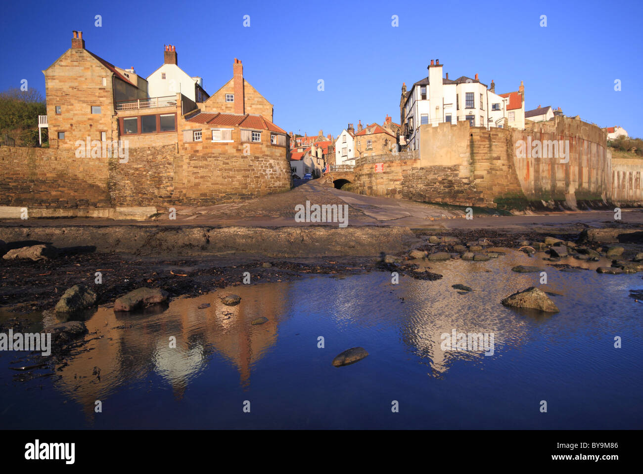 The picture book fishing village of Robin Hoods Bay bathed in early ...