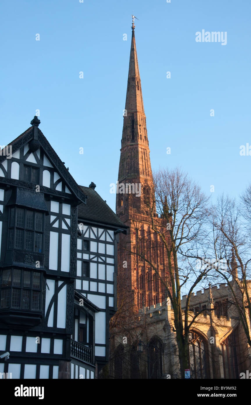 Holy Trinity Church next to a tudor building in Coventry, West Midlands ...