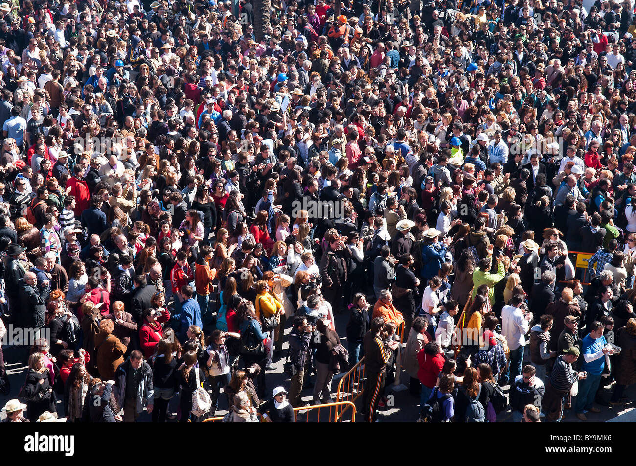 crowd of people waiting for the fireworks to start at fallas festival ...