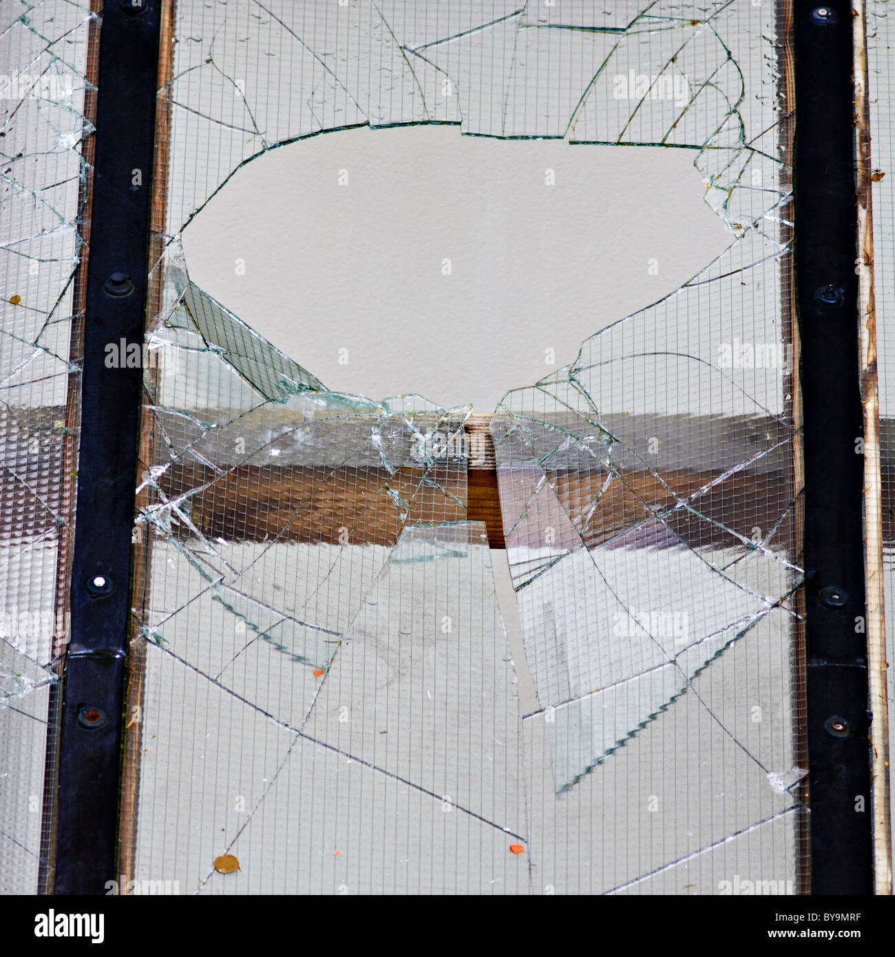 Broken glass windows Stock Photo - Alamy