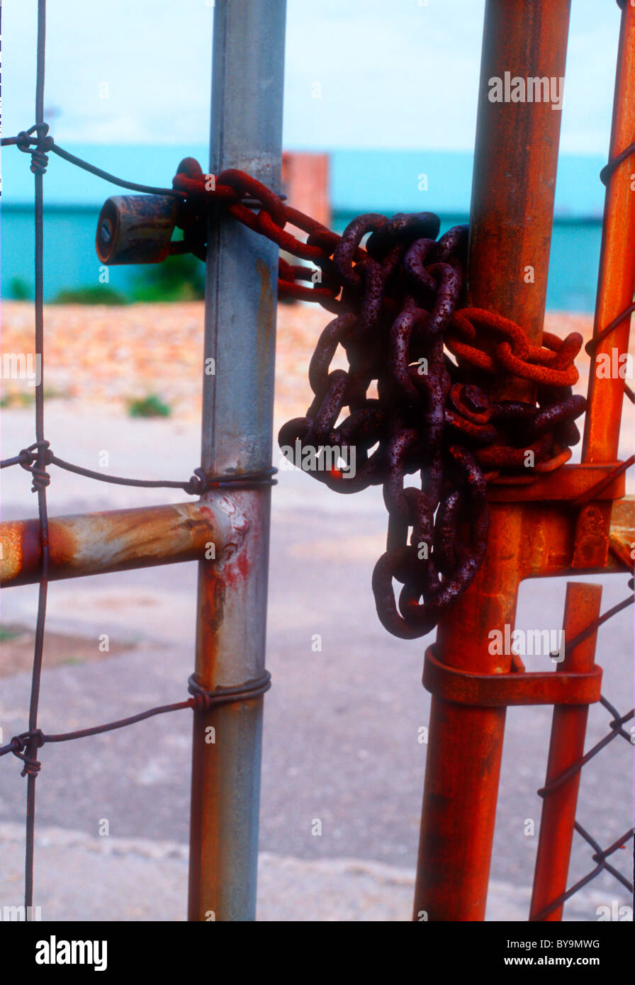Locked gate with chains Lock Stock Photo - Alamy
