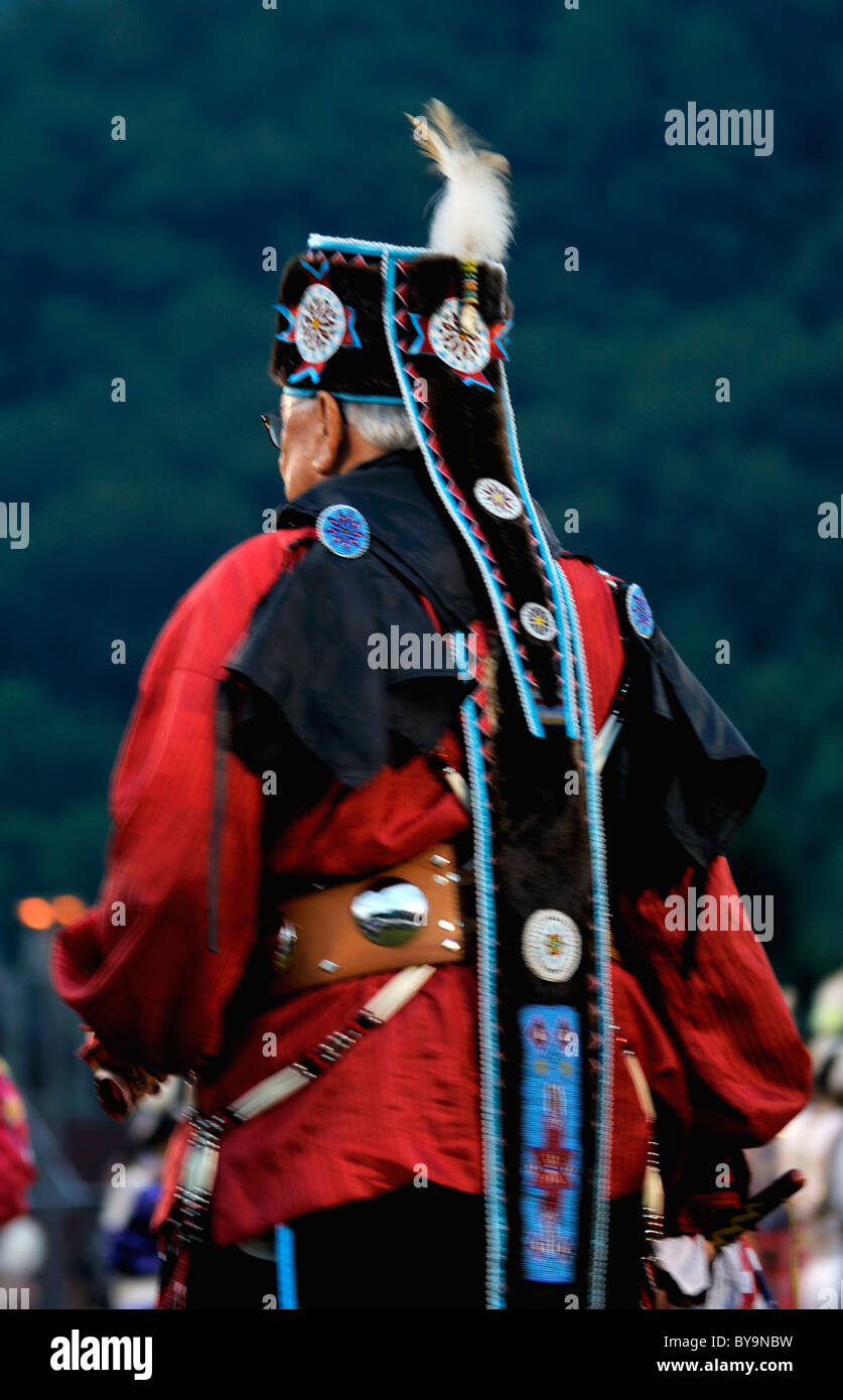A senor dancer at the Cherokee Pow Wow wearing a traditional costume ...