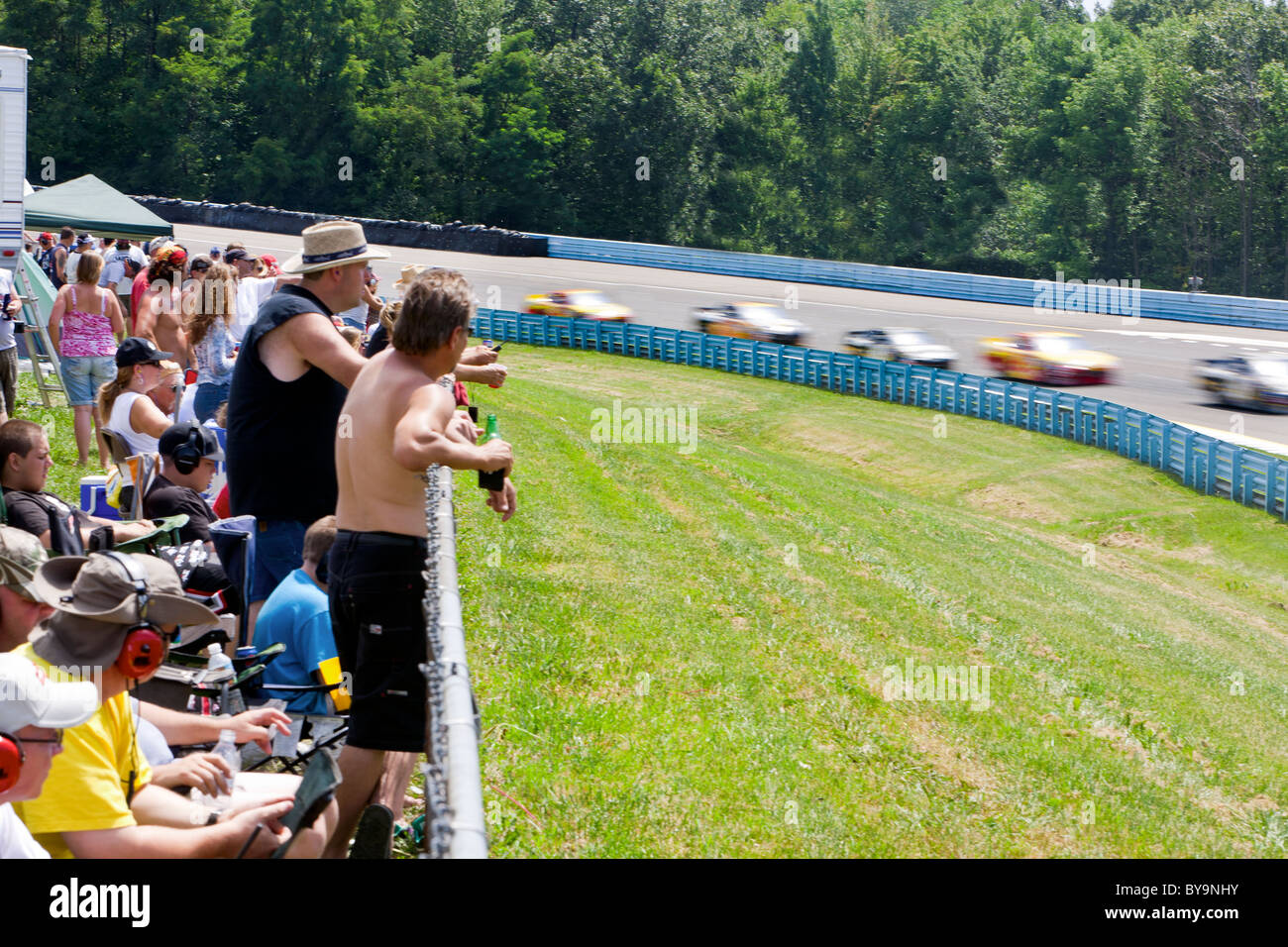 NASCAR Fans watching the race Stock Photo - Alamy