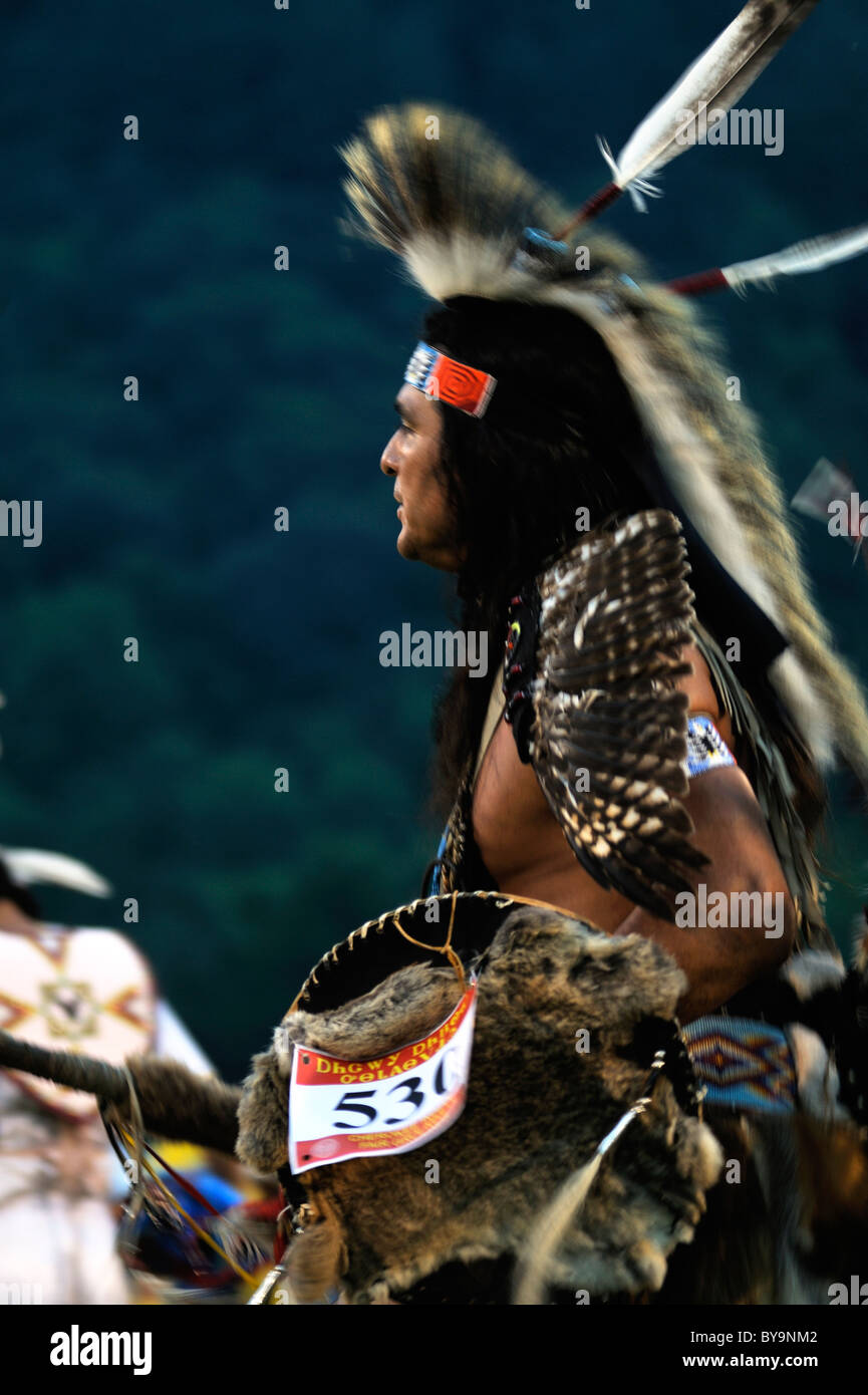 A Pow Wow dancer in traditional dress prepares to compete.at the ...