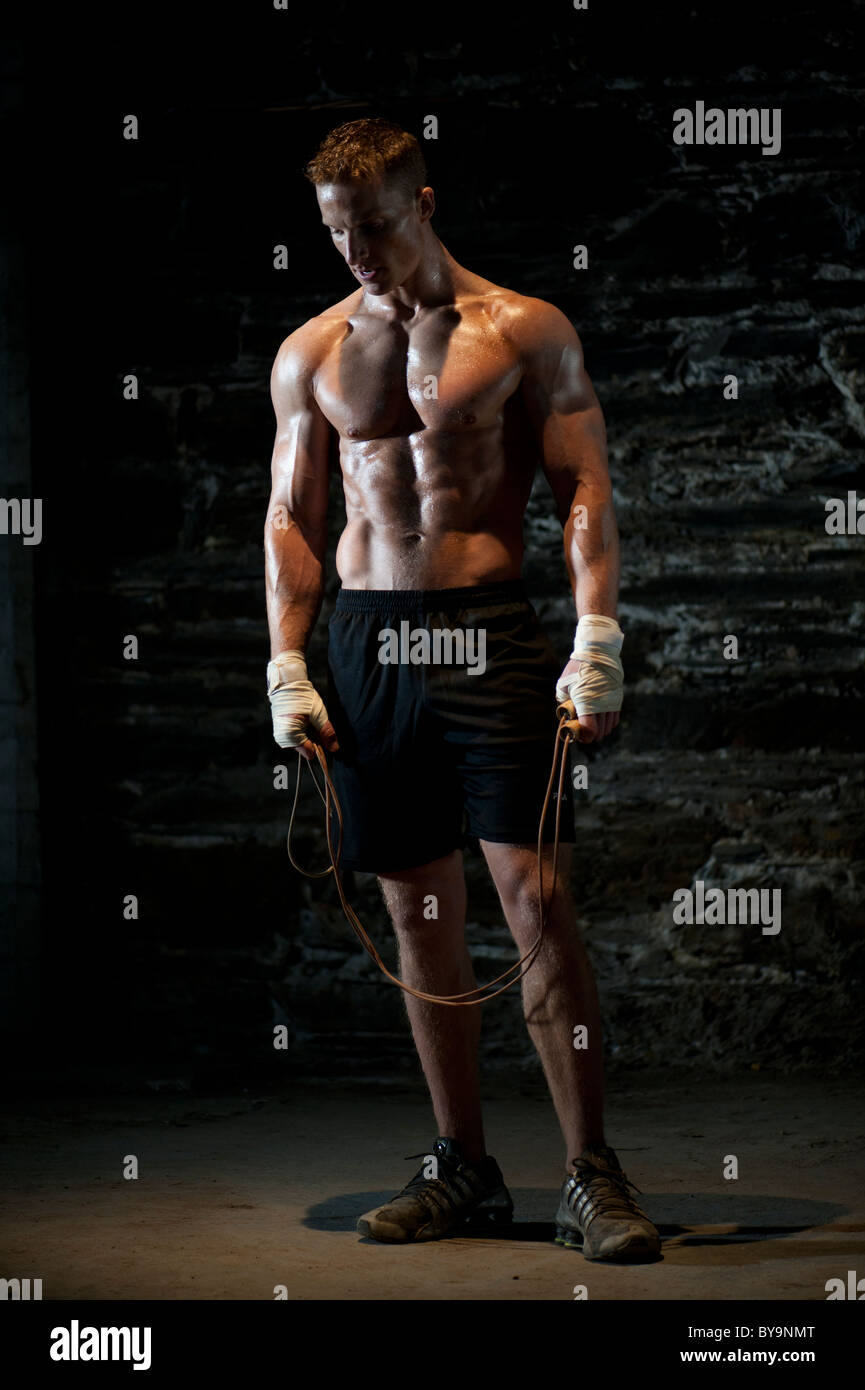 Portrait of an extremely fit man during training Stock Photo - Alamy