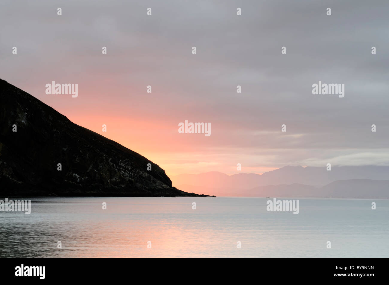 Dramatic sunrise illuminating atlantic ocean sea at minard beach ...