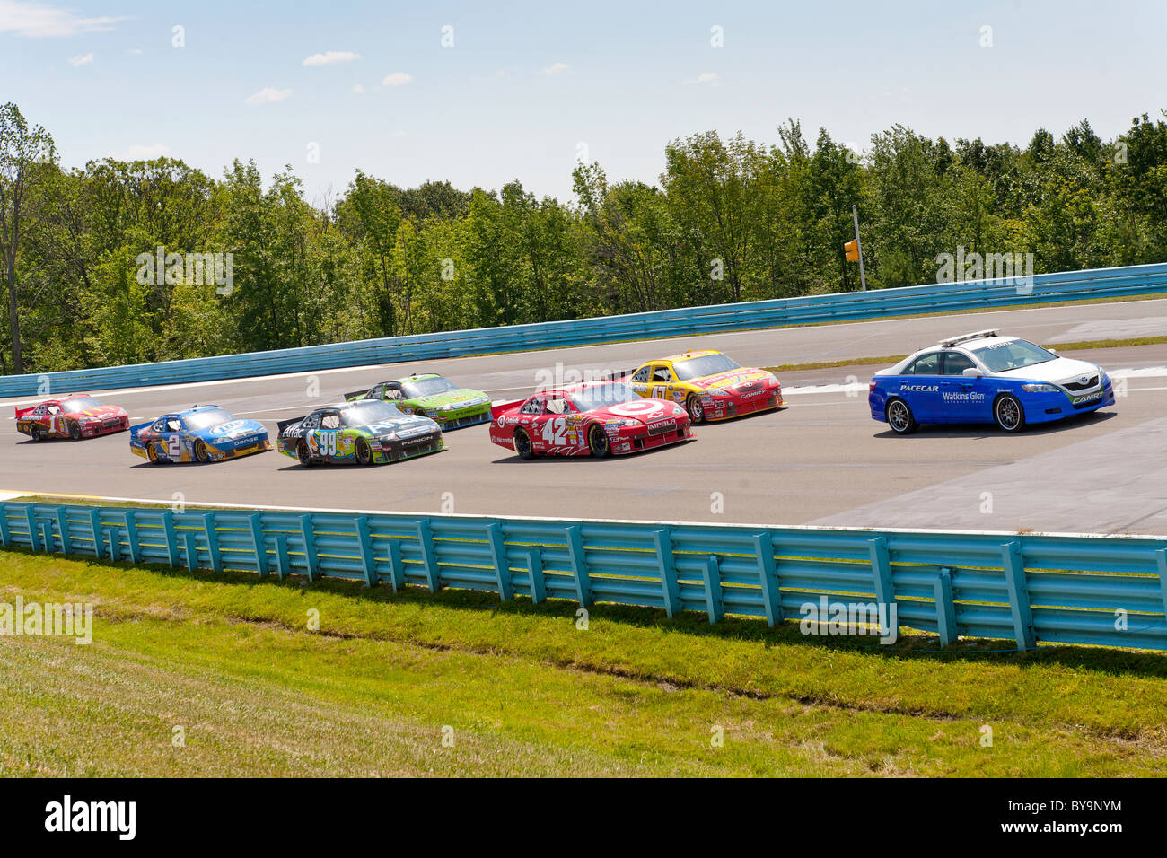 NASCAR Race cars speeding on race track Stock Photo - Alamy