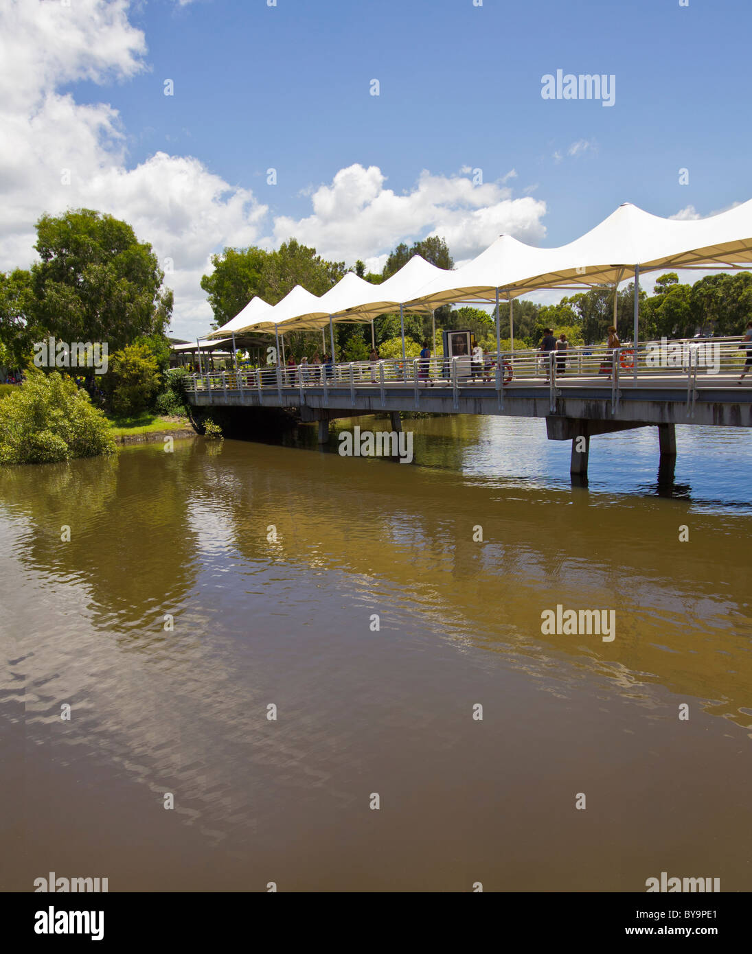 Pedestrian walkway across river Stock Photo - Alamy