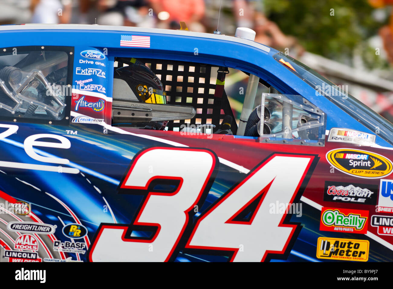 NASCAR Race cars speeding on race track Stock Photo - Alamy