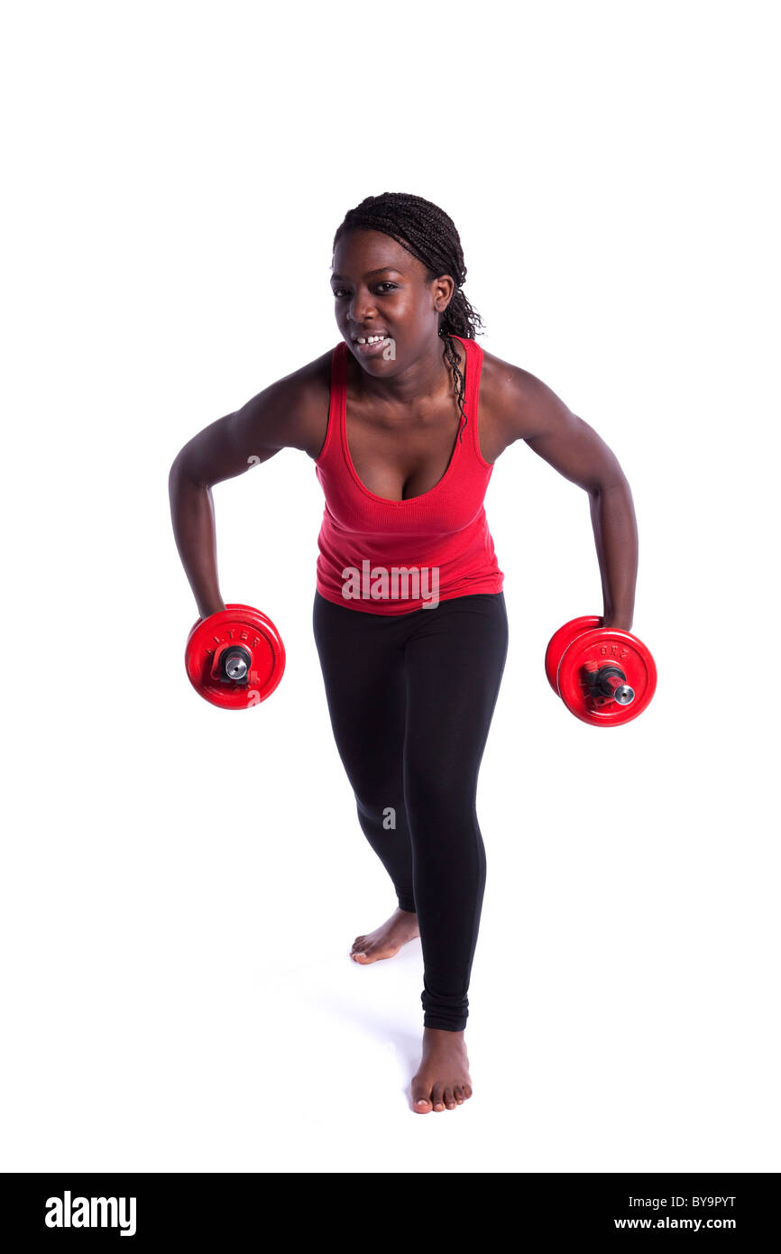 african young woman exercising her muscle with dumbbell (isolated on ...
