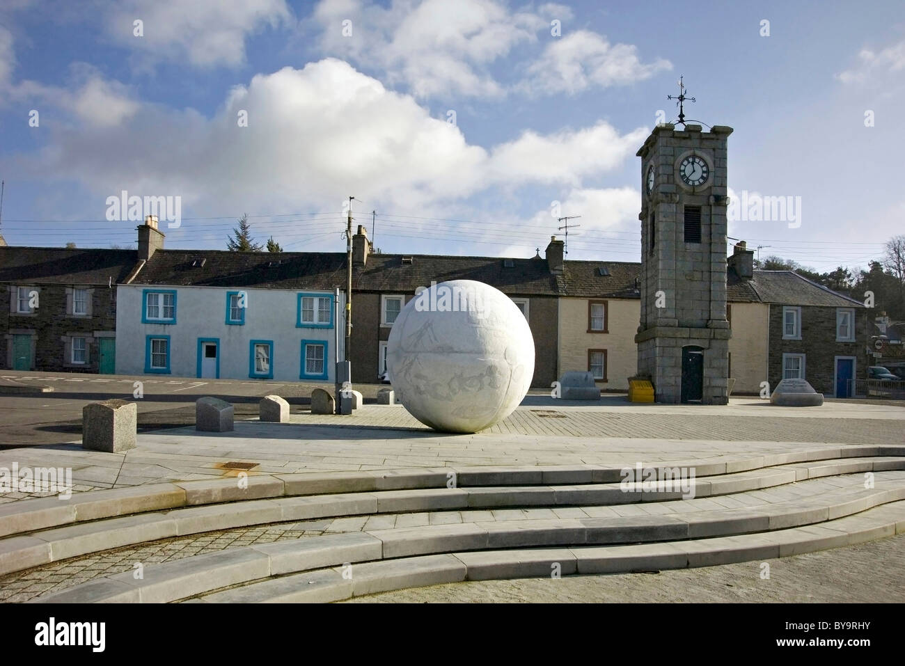 Creetown, carved granite ball and main Street, Wigtownshire Stock Photo ...