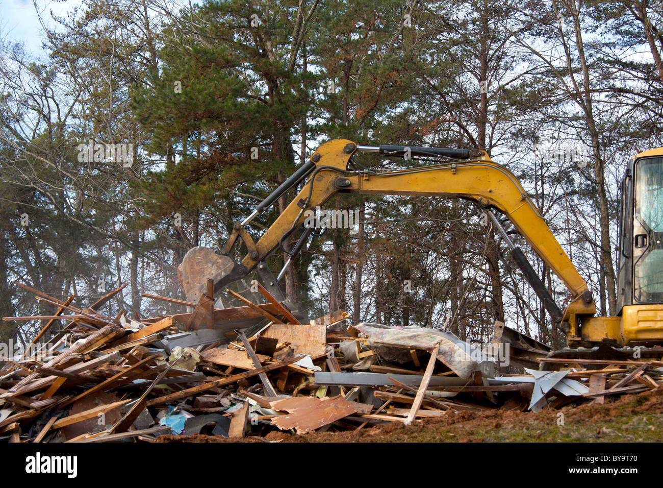 Excavator demolition activity on an old building Stock Photo - Alamy