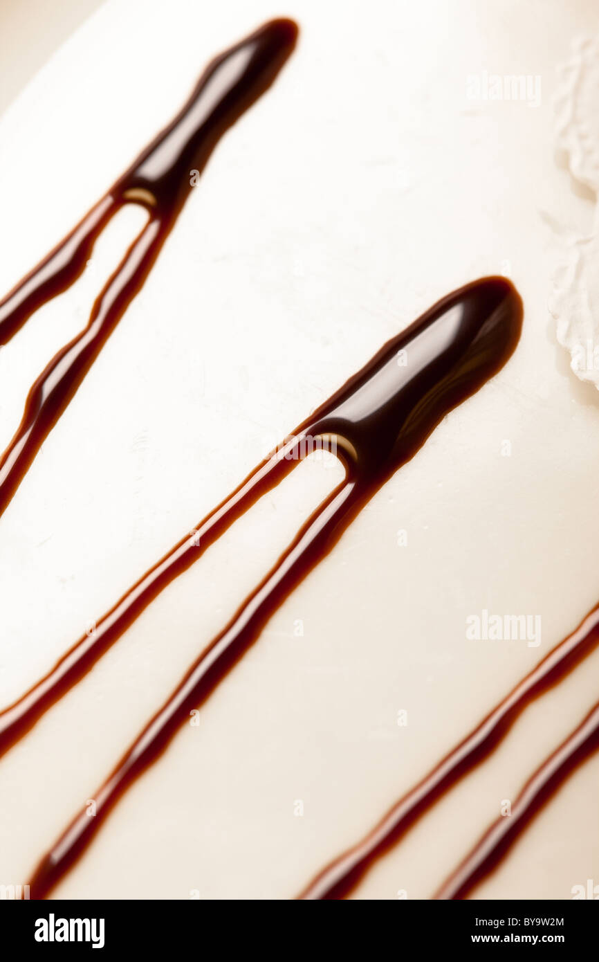 Lines of chocolate sauce Stock Photo - Alamy