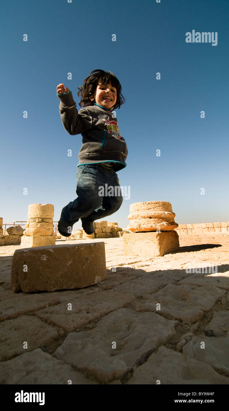 Children jumping in air in park hi-res stock photography and images - Alamy