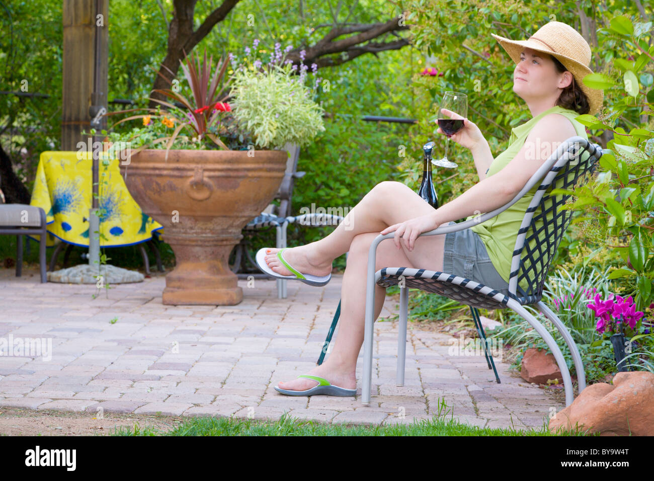 Relaxing in a garden Stock Photo - Alamy