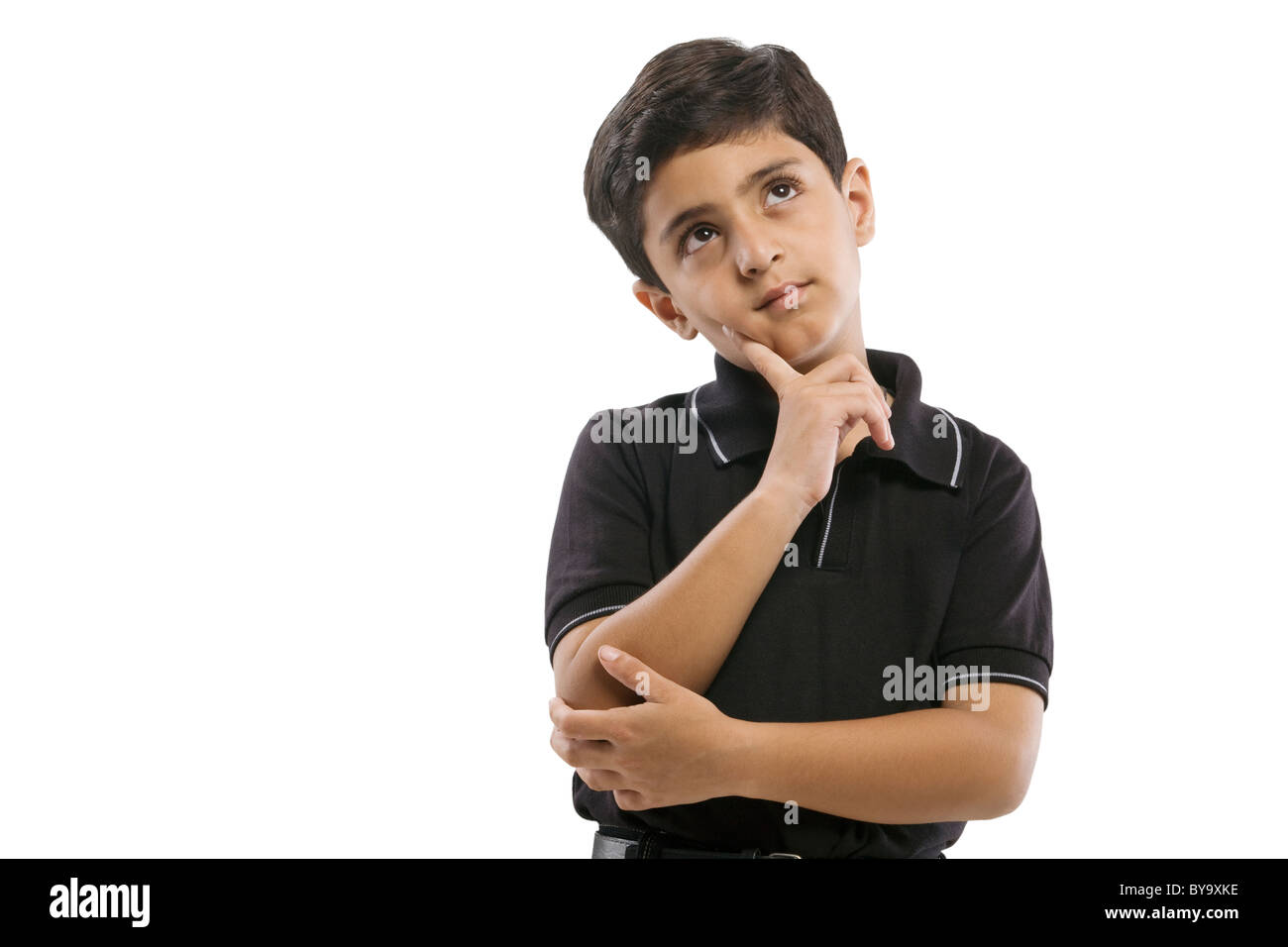 Young boy thinking Stock Photo - Alamy