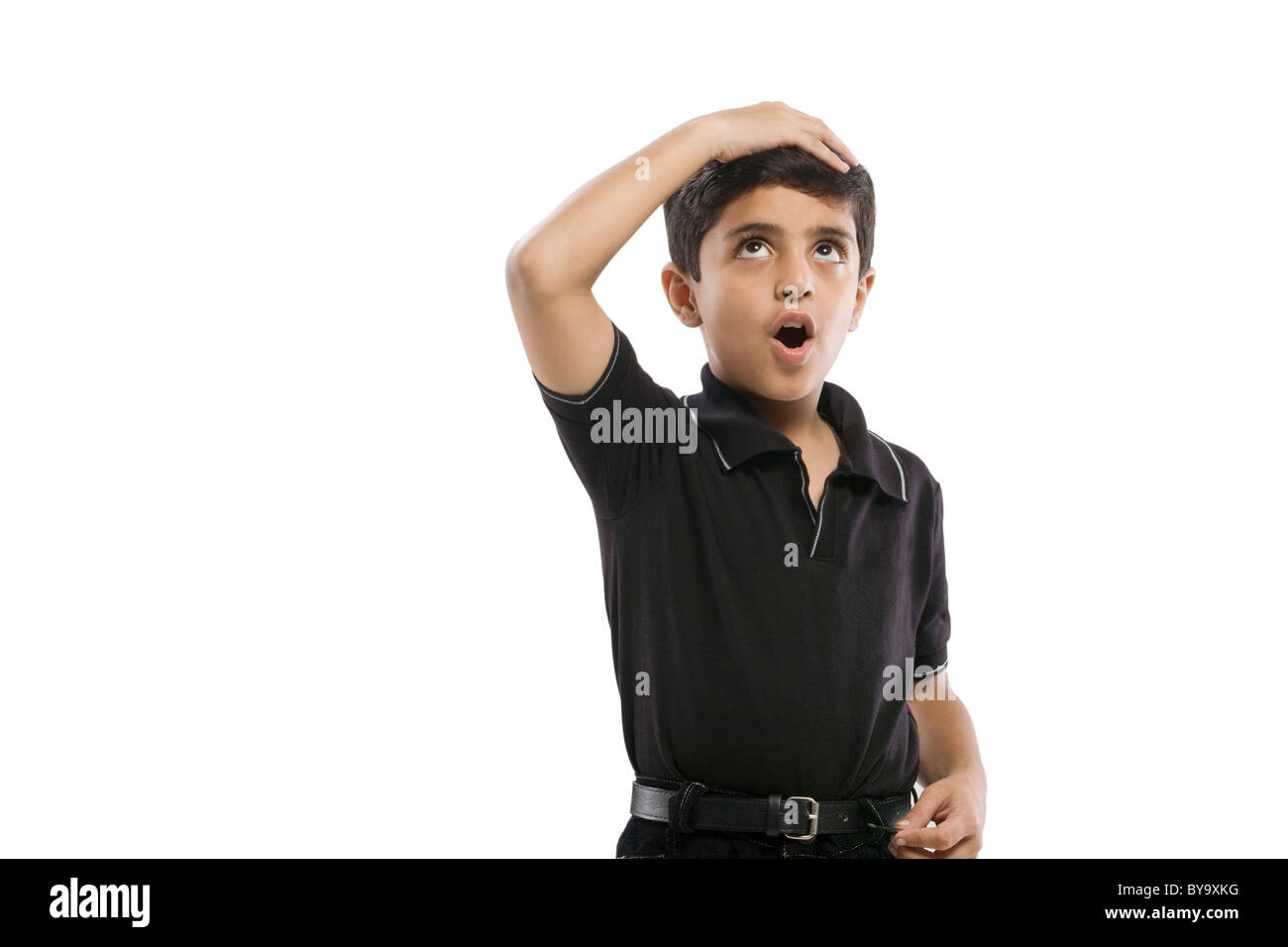 Young boy forgetting something Stock Photo - Alamy