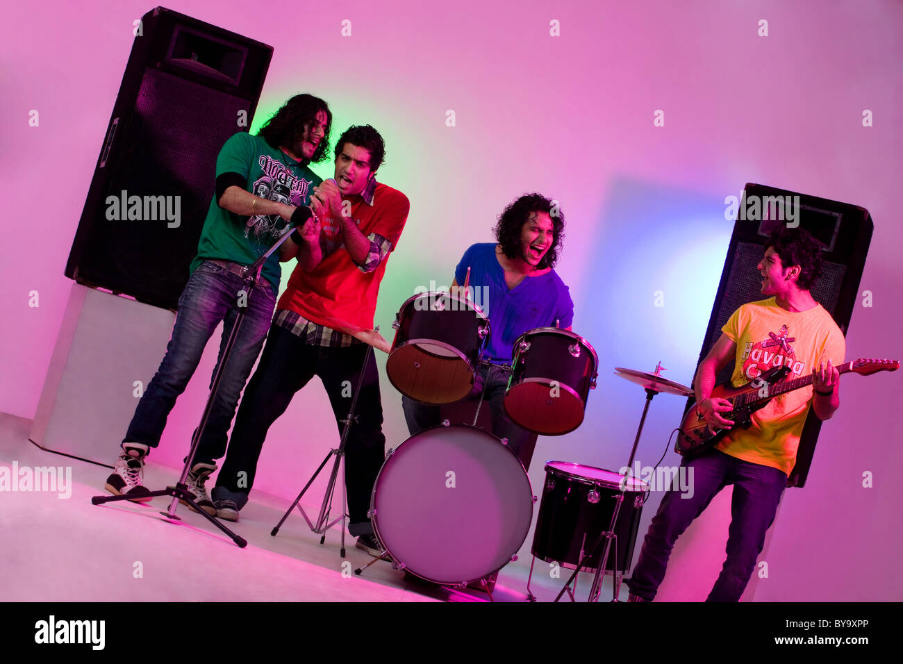 Boys of a rock band enjoying themselves Stock Photo - Alamy