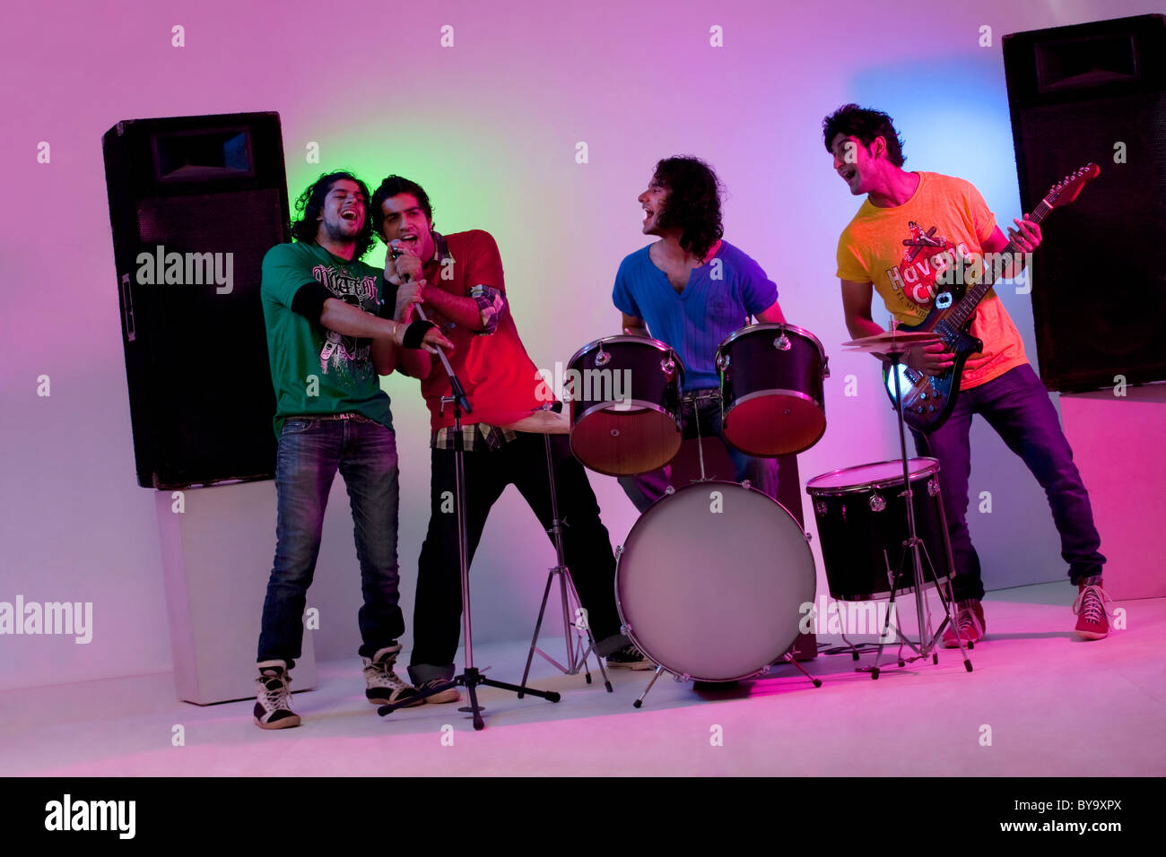 Boys of a rock band enjoying themselves Stock Photo - Alamy