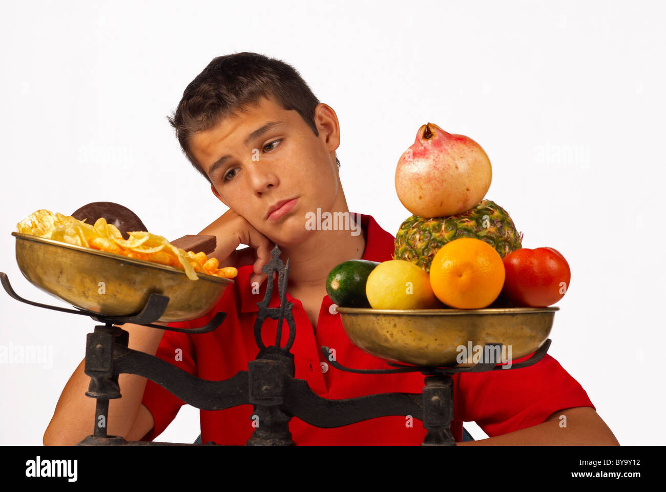 Teenager badly wanting junk food instead healthy one Stock Photo - Alamy
