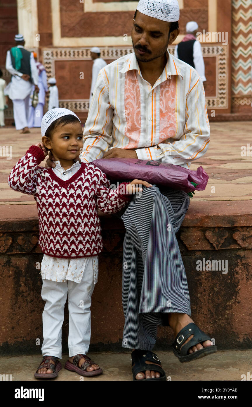 Father and son. celebratig Id Ul Zuha in the Taj Mahal Stock Photo - Alamy