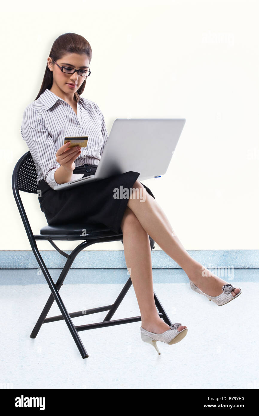 Secretary sitting legs hi-res stock photography and images - Alamy