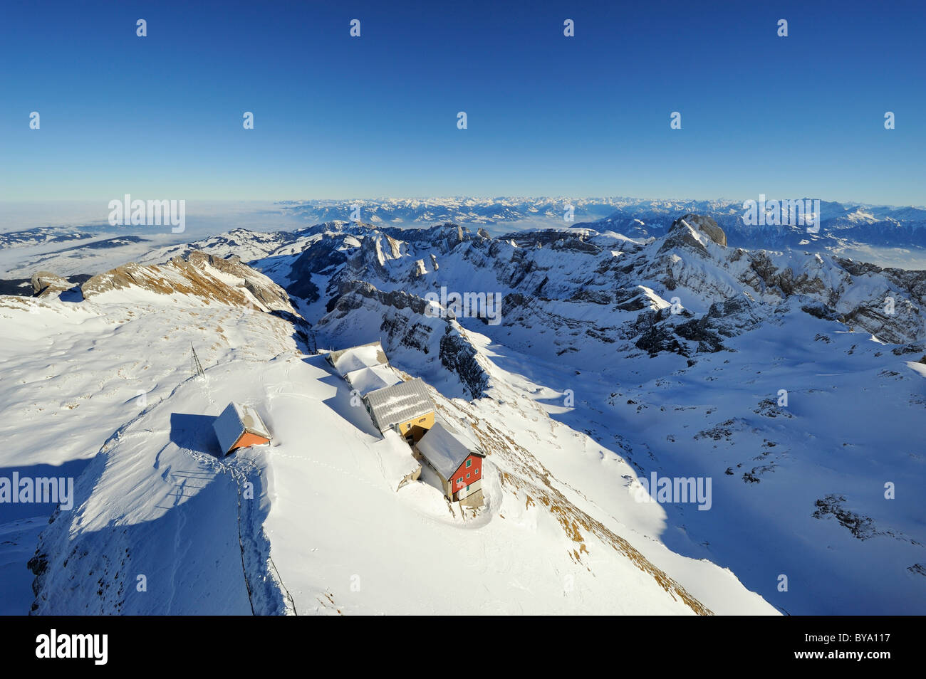 Snow-covered Alpstein massif and some mountain inns as seen from the ...