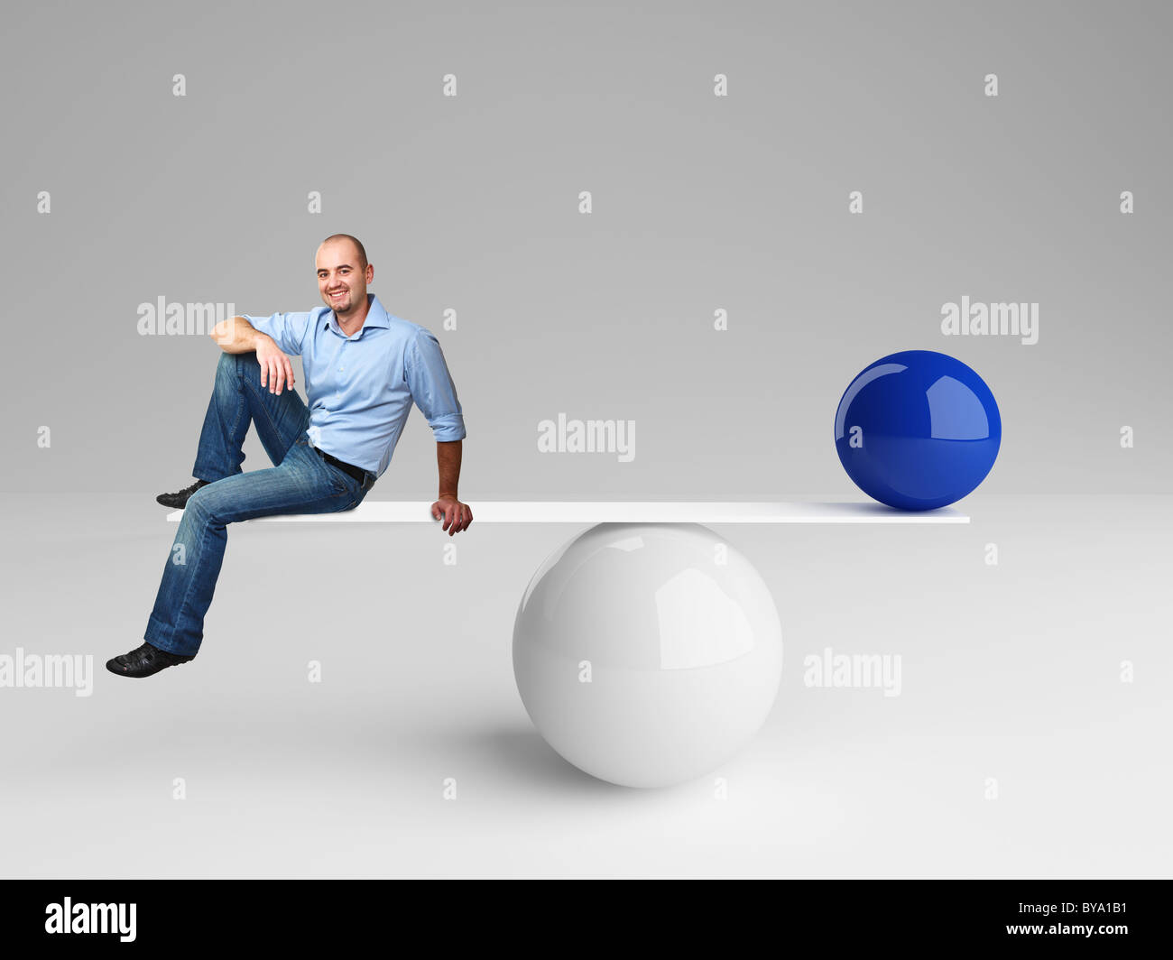 smiling man on 3d balance with blue ball Stock Photo - Alamy