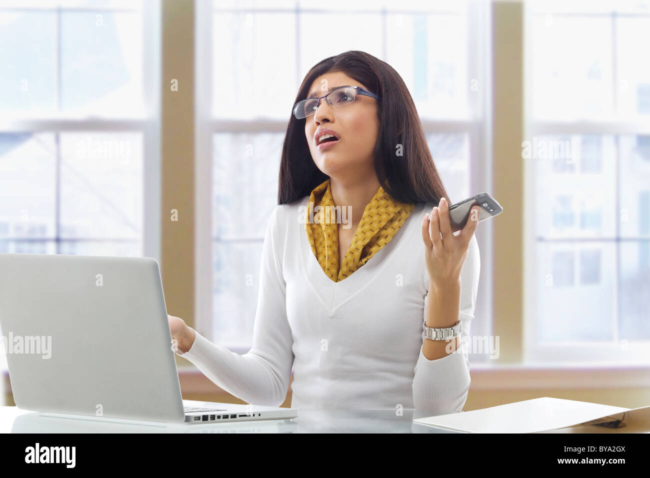 Businesswoman getting frustrated Stock Photo - Alamy