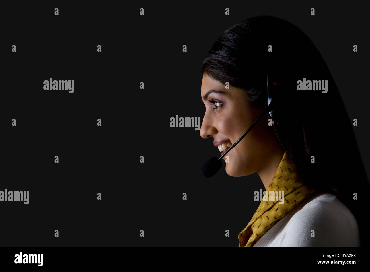 Secretary with headphones and mic Stock Photo - Alamy