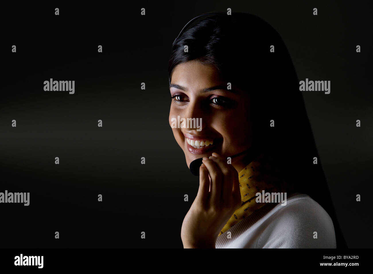 Secretary with headphones and mic Stock Photo - Alamy