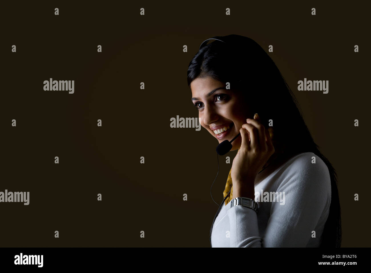 Secretary with headphones and mic Stock Photo - Alamy