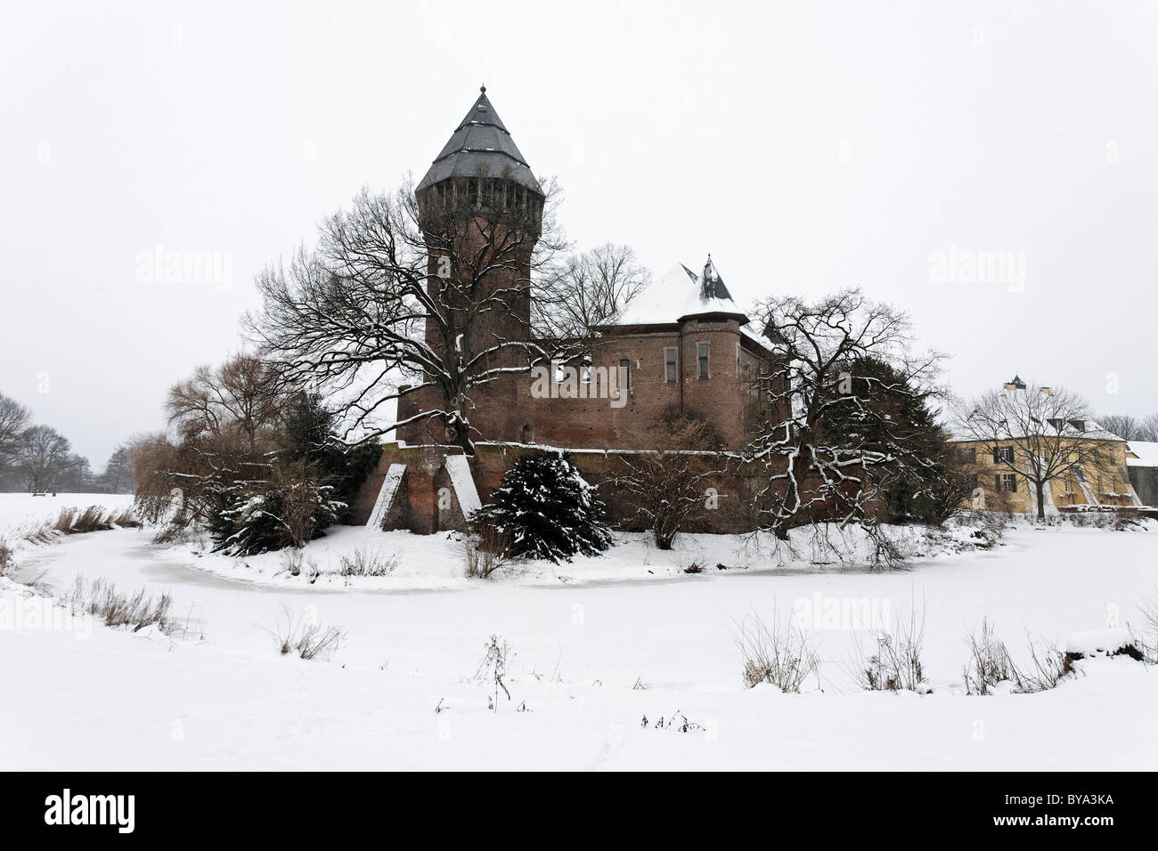 Romantic moated castle in winter, Linn Castle, Krefeld, Lower Rhine ...